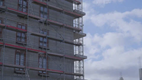 Scaffolding set up next to a building un... | Stock Video | Pond5