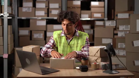 Scanning barcode on delivery parcel. Wor... | Stock Video | Pond5