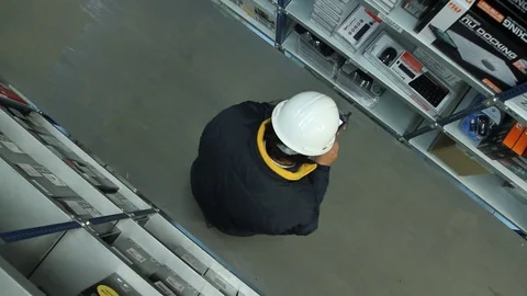 Scanning box labels in warehouse | Stock Video | Pond5