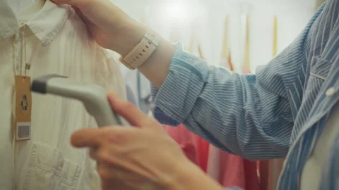 Scanning label barcodes with a red laser... | Stock Video | Pond5