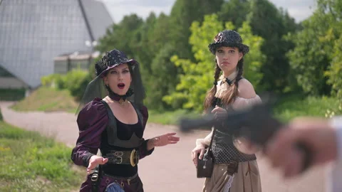 Scared beautiful ladies in steampunk out... | Stock Video | Pond5
