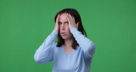 Scared Caucasian Woman on Green Screen | Stock Video | Pond5