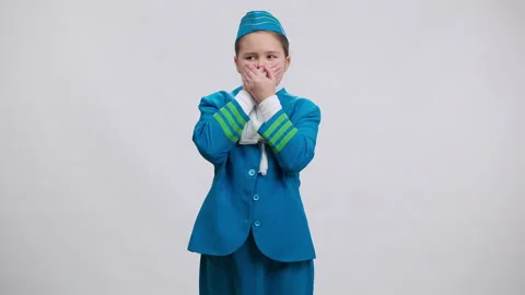 Scared girl in stewardess uniform closin... | Stock Video | Pond5