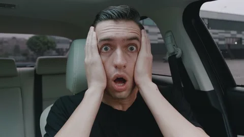 Scared man driver looks into camera with... | Stock Video | Pond5