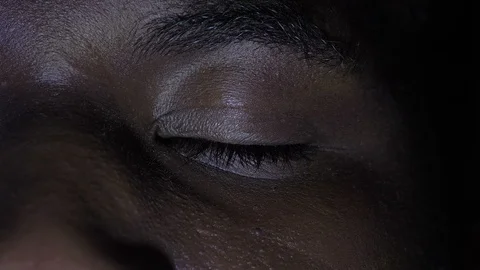 scared, scary black man opening his eye ... | Stock Video | Pond5