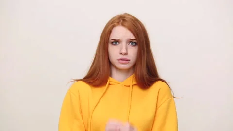 Scared shocked ginger redhead curly youn... | Stock Video | Pond5