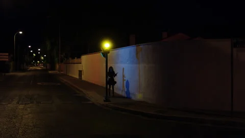 Scared Young Woman Looking Back While Wa... | Stock Video | Pond5
