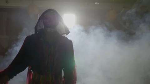 Scary actor dressed in a frightening hal... | Stock Video | Pond5
