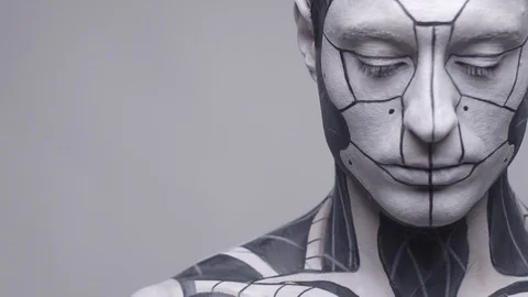 Scary android with white eyes is looking... | Stock Video | Pond5