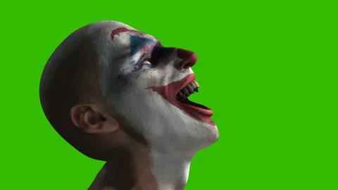 The scary, creepy clown laughs with a ni... | Stock Video | Pond5