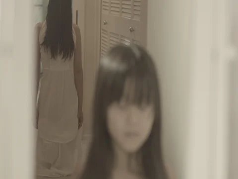 Scary Ghost Woman Standing Behind Girl i... | Stock Video | Pond5