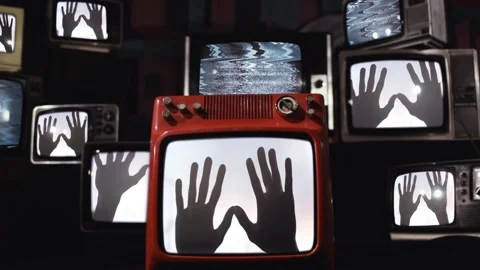 Scary Haunted Old TV Sets with Ghost Han... | Stock Video | Pond5