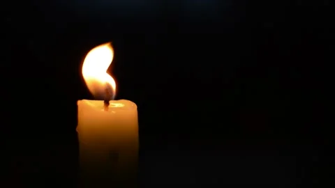 scary horror fire of a glowing red candl... | Stock Video | Pond5