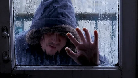 Scary Man Appears On Frozen Winter Windo... | Stock Video | Pond5