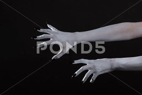 Scary pale ghost hands with black nails Stock Photo #55865805