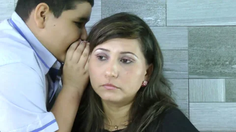 Scary secrets. Boy telling an impressive... | Stock Video | Pond5