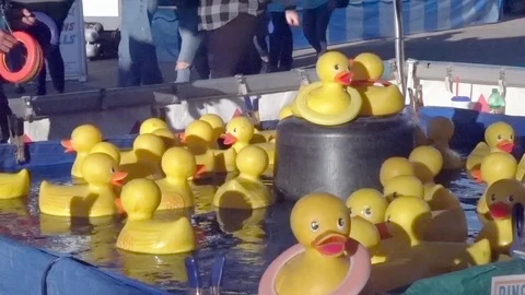 Scene from the duck ring toss game at th... | Stock Video | Pond5