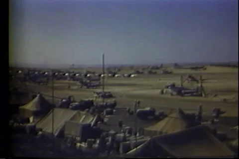 Scene of military base camp with weapons... | Stock Video | Pond5