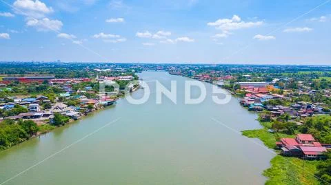 The scenery along both sides of the Chao Phraya River located in the ...