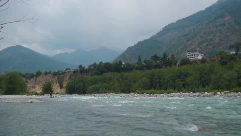 Scenic view of Beas river flowing in bac... | Stock Video | Pond5
