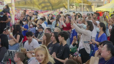 Scenic view of the crowd clapping for a ... | Stock Video | Pond5