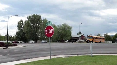 School bus busy road intersection stop s... | Stock Video | Pond5