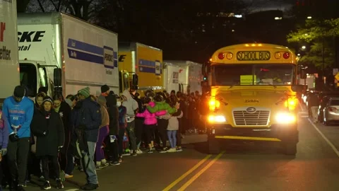 School Bus Driving On Crowded Street At ... | Stock Video | Pond5