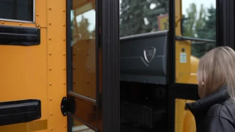 School bus opening doors for high school... | Stock Video | Pond5