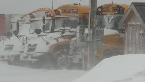 School bus parked in snow and blizzard s... | Stock Video | Pond5