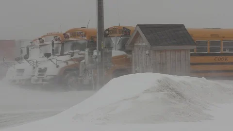 School bus parked in snow and blizzard s... | Stock Video | Pond5