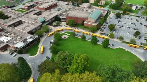 School buses at American high school pic... | Stock Video | Pond5