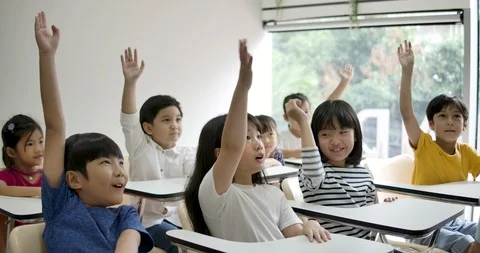School children answer questions in clas... | Stock Video | Pond5
