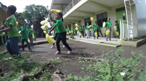School children pom poms exercise | Stock Video | Pond5