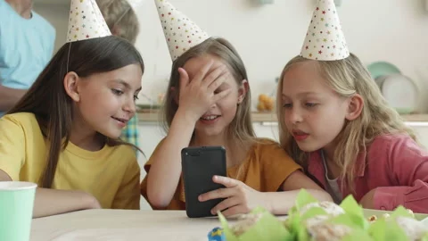School Girls Using Smartphone on Party | Stock Video | Pond5