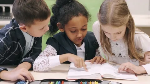 School kids learning togetehr in a moder... | Stock Video | Pond5