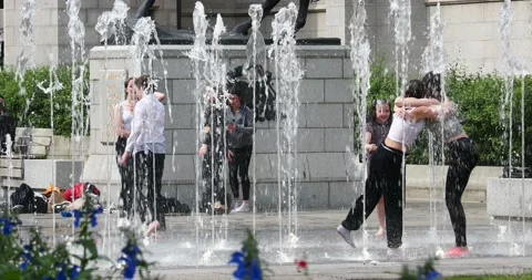 School kids playing in fountains outside... | Stock Video | Pond5
