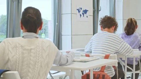 Schoolboy Passing Cheat Sheet to Classma... | Stock Video | Pond5