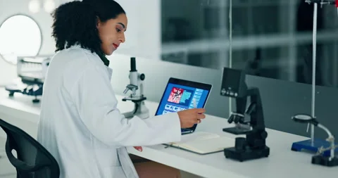 Scientist, computer screen and writing m... | Stock Video | Pond5