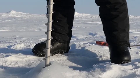 Scientist drilling holes in ice on Beauf... | Stock Video | Pond5