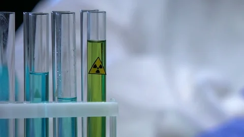 Scientist putting radioactive liquid in ... | Stock Video | Pond5