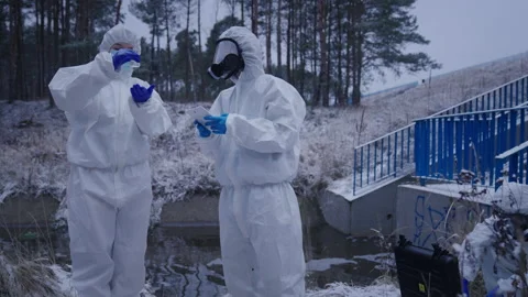 Scientists picking biohazardous samples,... | Stock Video | Pond5