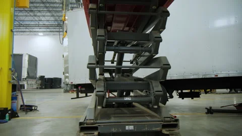 A scissor lift aerial work platform is f... | Stock Video | Pond5