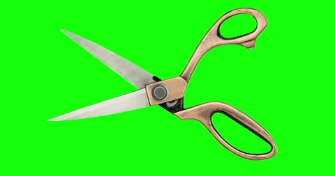 Scissors stop-motion animation on green ... | Stock Video | Pond5