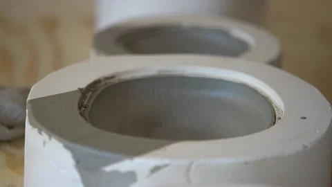 Scraping clay slip off mould | Stock Video | Pond5