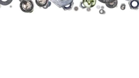 Screws falling down on white background ... | Stock Video | Pond5