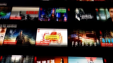 scrolling Netflix offering on a tv scree... | Stock Video | Pond5