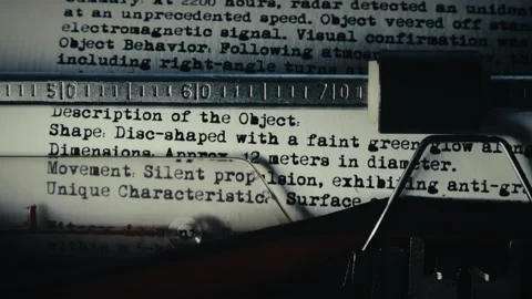 Scrolling text on typewriter reveals UFO... | Stock Video | Pond5