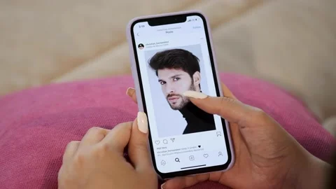 Scrolling through Instagram and liking p... | Stock Video | Pond5