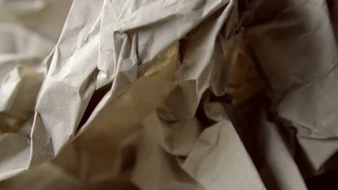 Scrunched up brown paper texture UHD sto... | Stock Video | Pond5