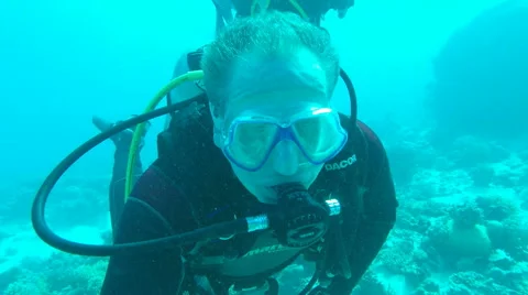 Scuba Diver frog kick in clear Red Sea w... | Stock Video | Pond5